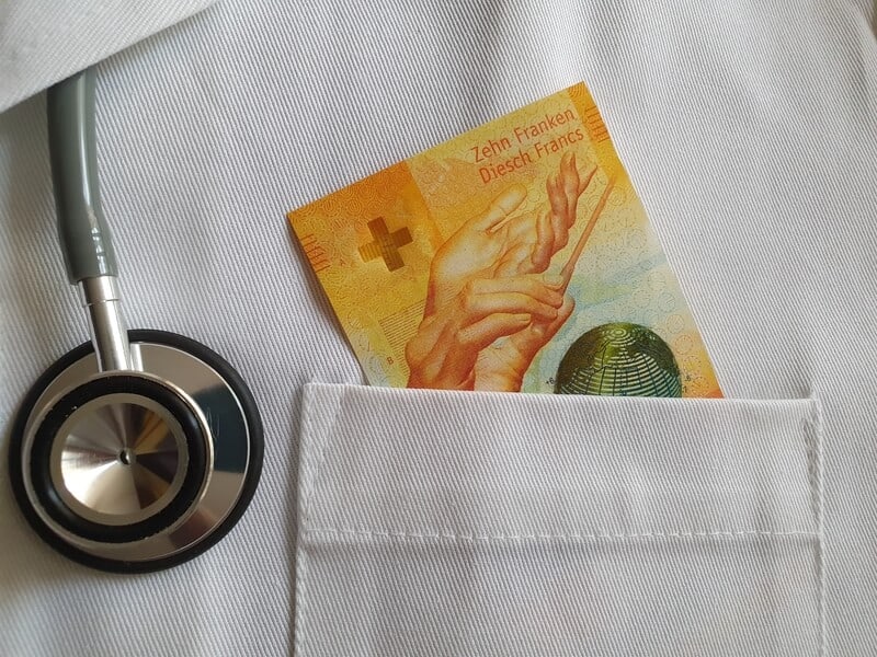 Swiss health premiums to rise for many in 2022 despite average price fall